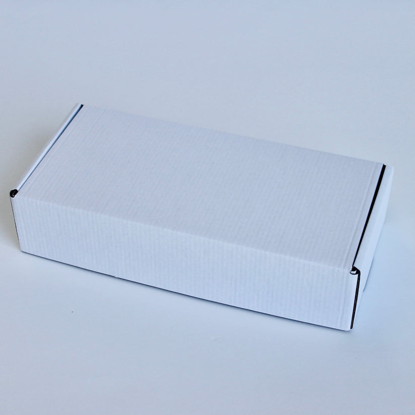 Júpiter Box Blanco – Boxology Empaques